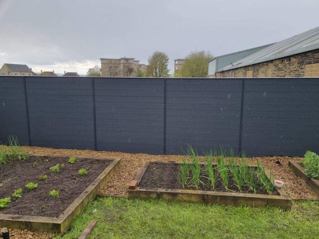 Anthracite Dura posts and grey composite fencing - Care Fencing company ...